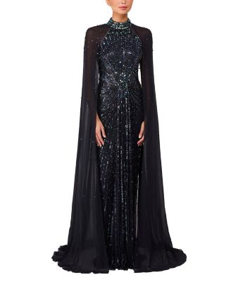 Click here for Jenny Packham Thea Embellished Cape Maxi Dress prices