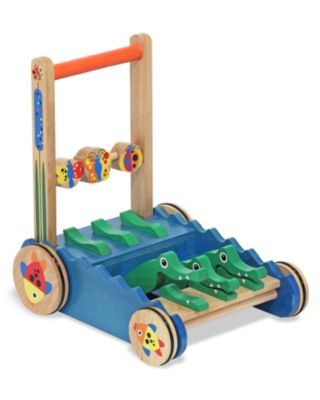Click here for Melissa & Doug Chomp & Clack Alligator Push Toy -... prices