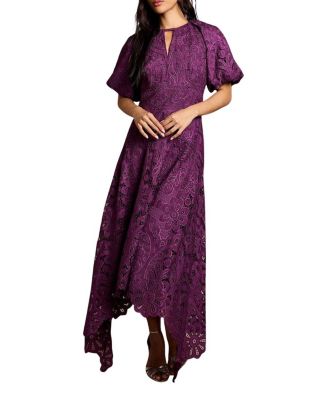 Click here for Coast Lace Hanky Hem Puff Sleeve Dress prices