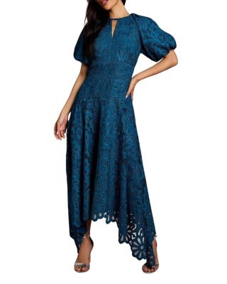 Click here for Coast Lace Hanky Hem Puff Sleeve Dress prices