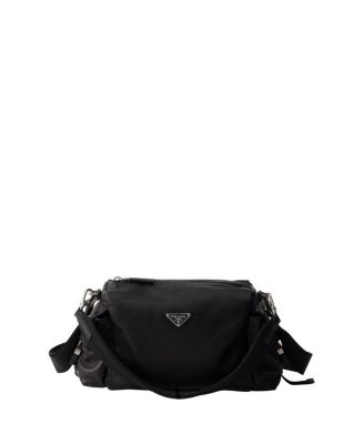 Click here for Prada Explore Leather Bag prices