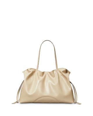 Click here for Tory Burch Ella natuura Drawstring Tote Bag prices