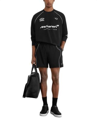 Click here for Reiss McLaren Unisex Regular Fit Raglan Logo Shirt prices