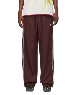 Click here for Adidas x Wales Bonner Regular Fit Stripe Track Pan... prices