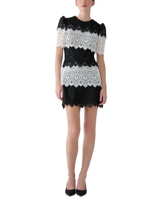 Click here for Carolina Herrera Tiered Lace Mini Dress prices