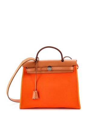 Click here for Pre-Owned HERMES 31 Herbag Zip Leather and Toile prices