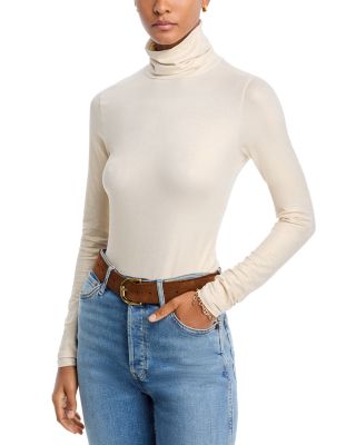 Click here for Majestic Filatures Metallic Turtleneck Top prices