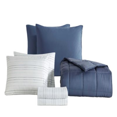 Click here for Calvin Klein Solid Washed Reversible Plush 7 Piece... prices