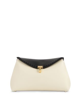 Click here for Toteme Embroidered Trim Leather Clutch prices