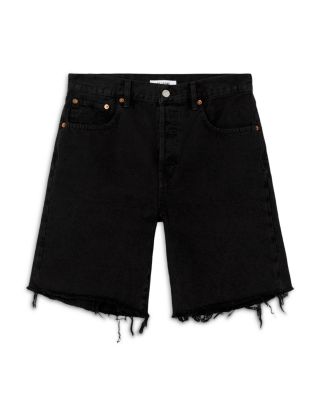 Click here for Re/Done 90s Comfy Mid Rise Jean Shorts in Crema prices