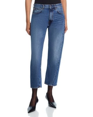 Click here for Toteme Twisted Seam Denim Jeans in Washed Blue prices