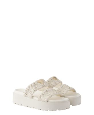Click here for Prada Womens Matelasse Nappa Leather Flatform Slid... prices