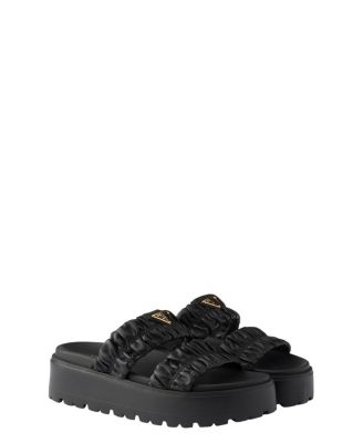 Click here for Prada Womens Matelasse Nappa Leather Flatform Slid... prices