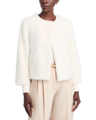 Click here for T Tahari Faux Fur Knit Cuff Jacket prices
