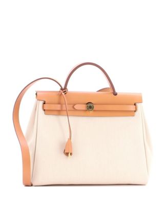 Click here for Pre-Owned HERMES 31 Herbag Zip Leather and Toile prices