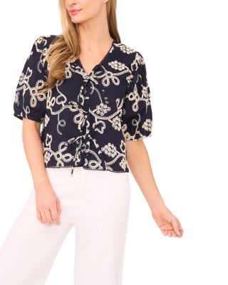 Click here for CeCe Embroidered Short Sleeve Tie Front Top prices